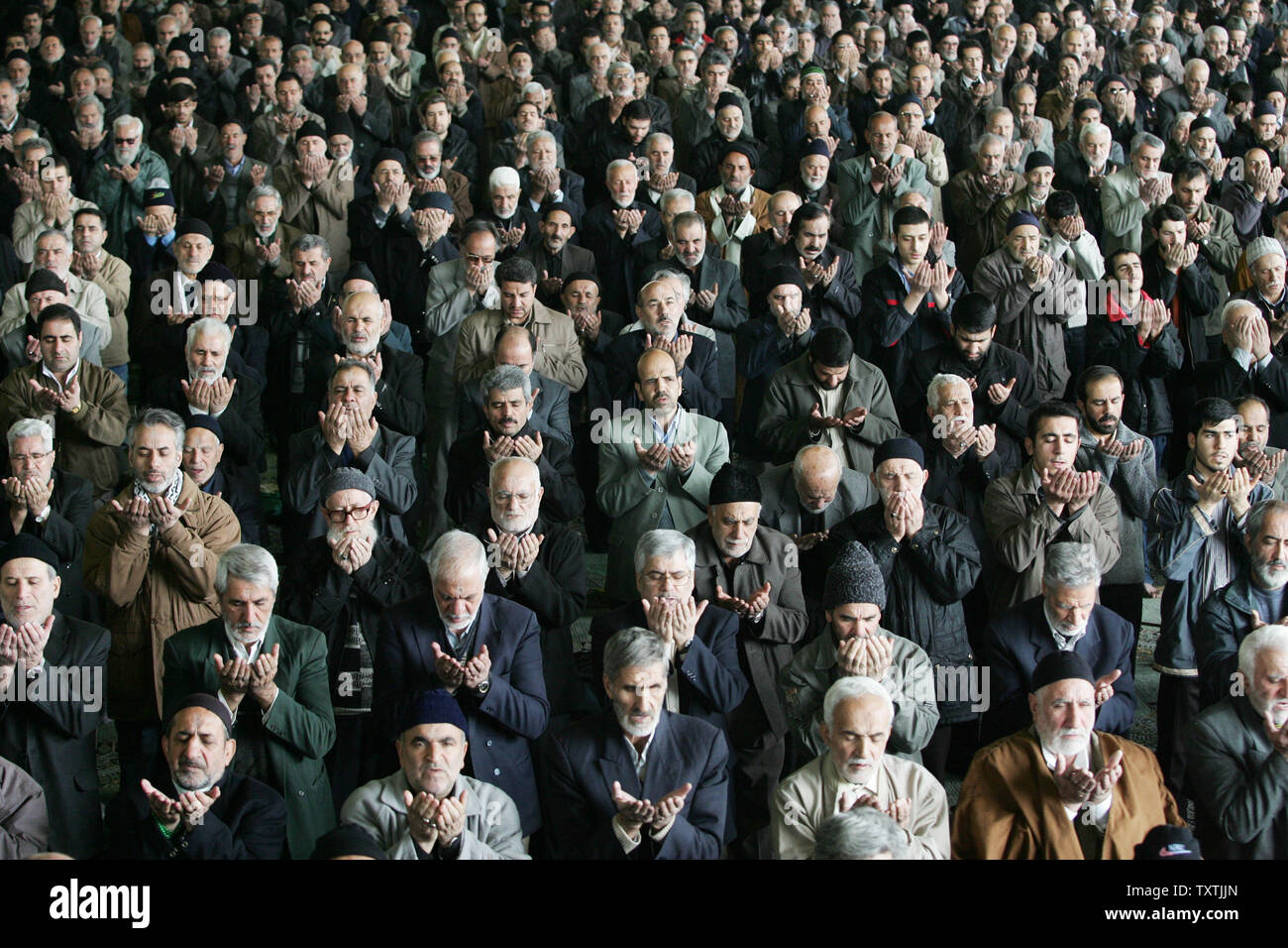 Iranian worshipers pray during Friday Prayer at Tehran University ...