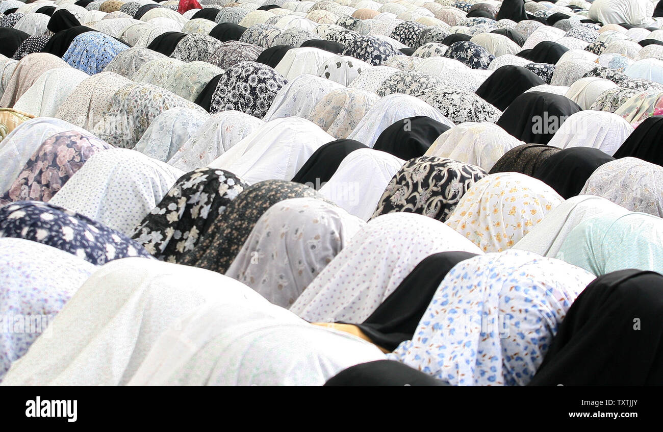 Iranian worshipers pray during Friday Prayer at Tehran University ...