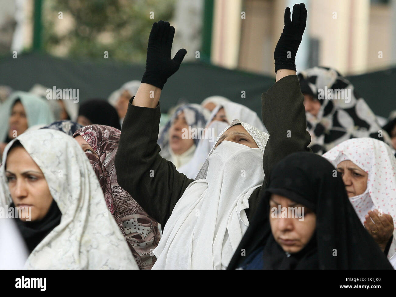 Iranian worshipers pray during Friday Prayer at Tehran University ...