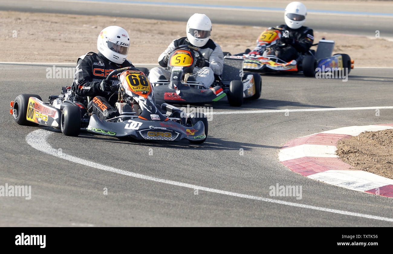 Iranian kart racers compete during a Karting championship race at ...