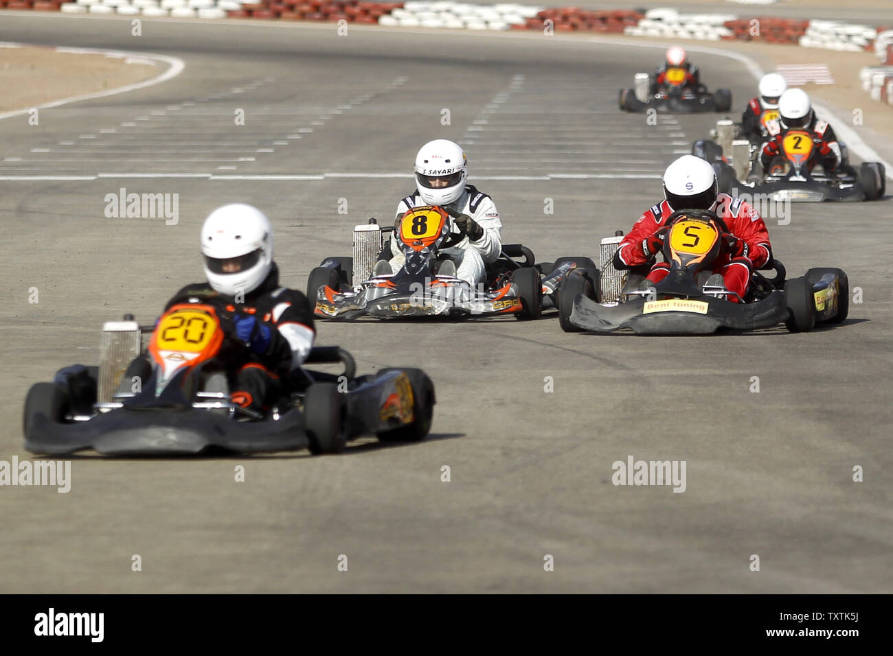Iranian kart racers compete during a Karting championship race at ...