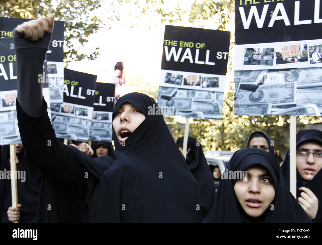 Iranian women chant slogans in front of the Swiss Embassy in Tehran to ...