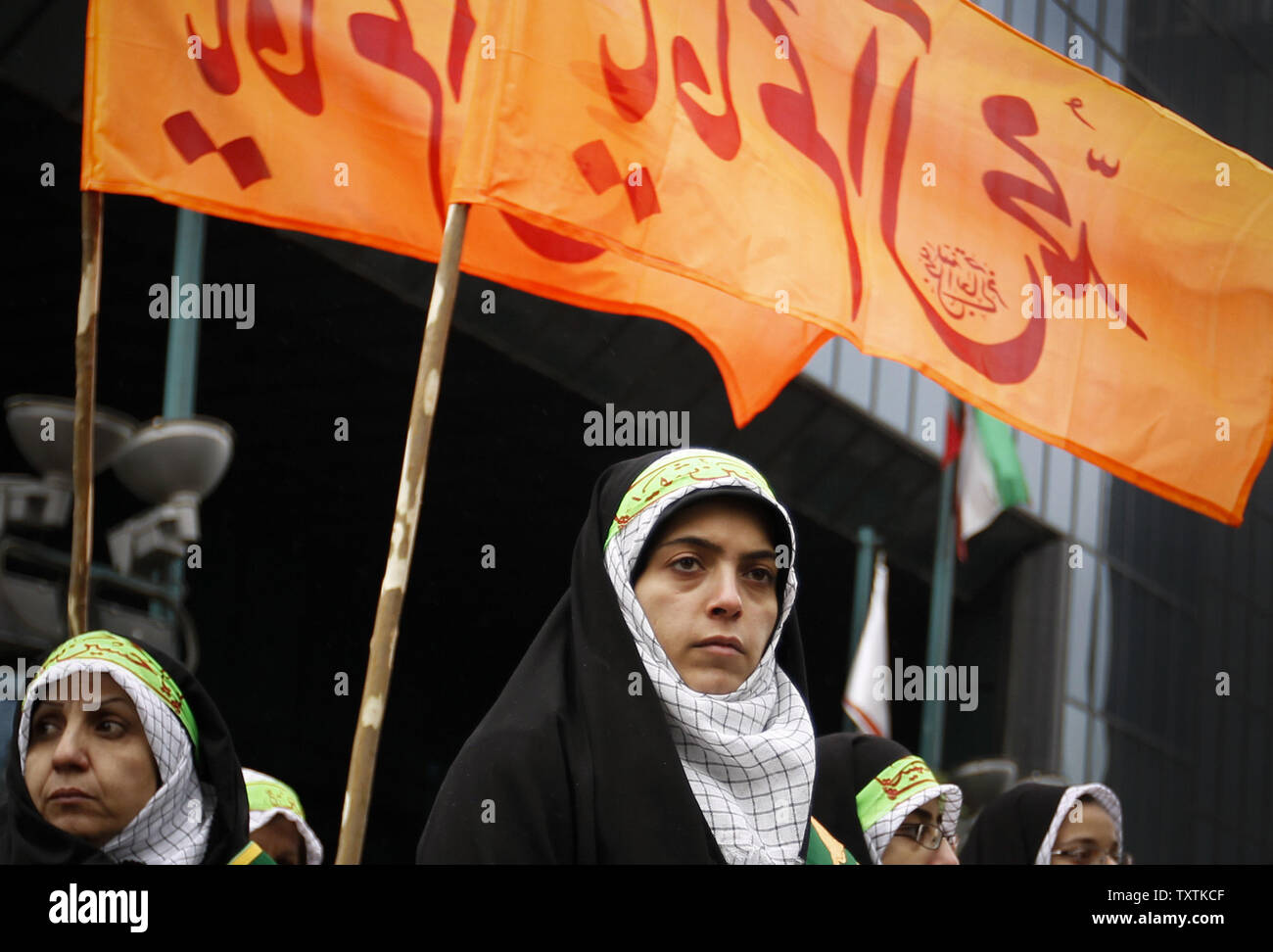Members of Iran's hardline Basij militia attend a rally marking Basij ...