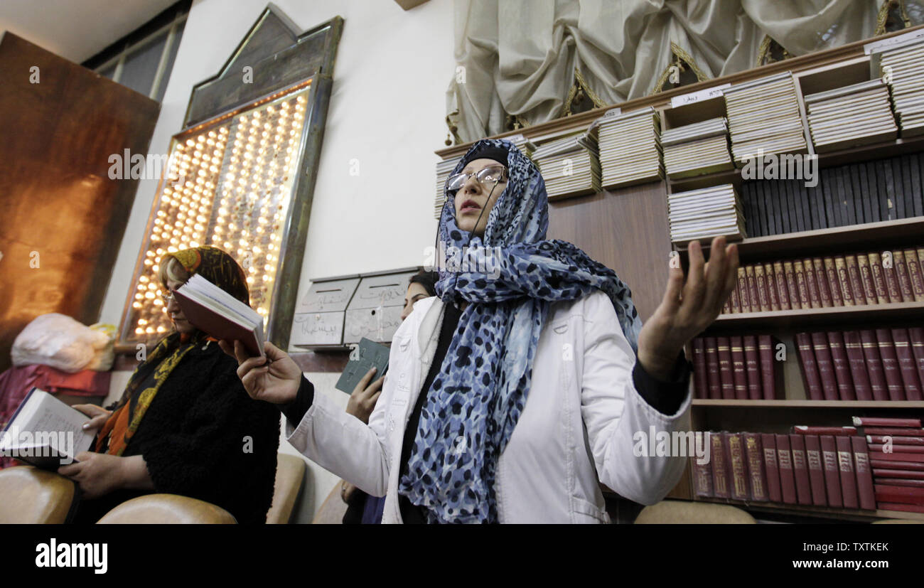 An Iranian Jewish woman prays during a Hanukkah celebration in Tehran ...