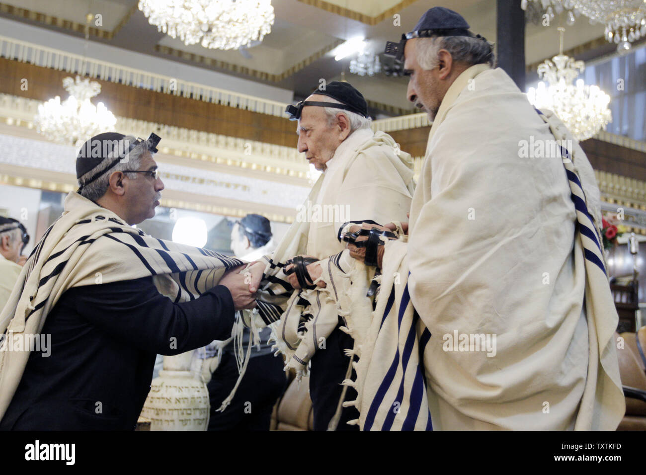 Iranian Jews participate in morning service in Tehran Synagogue on ...