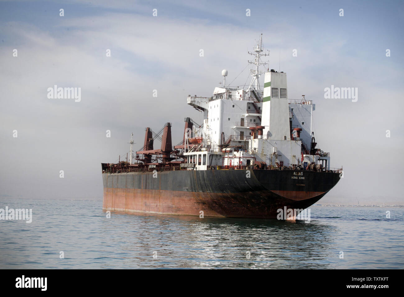 A cargo ship is seen in between Iranian city port of Bandar Abbas and ...