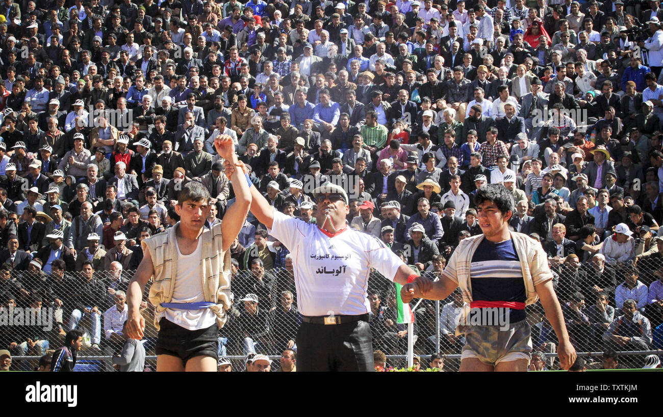Wrestlers compete in a traditional wrestling competition called ...
