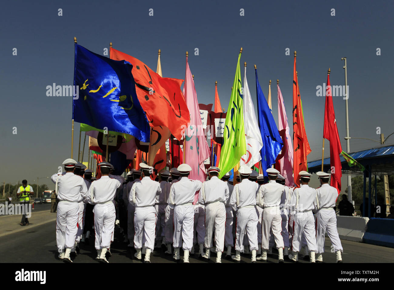Iranian soldiers march during the annual military parade on September ...