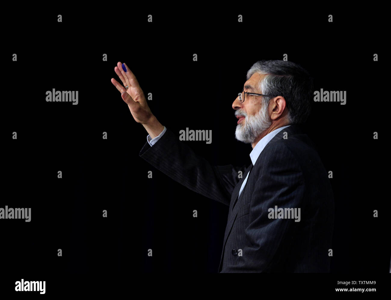 Lawmaker and former parliament speaker Gholam-Ali Haddad-Adel talks to ...