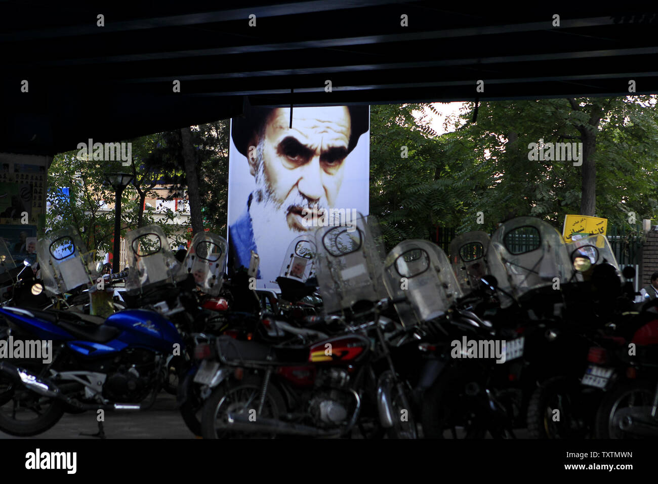 A poster of Iran's former leader Ayatollah Khomeini is displayed during ...