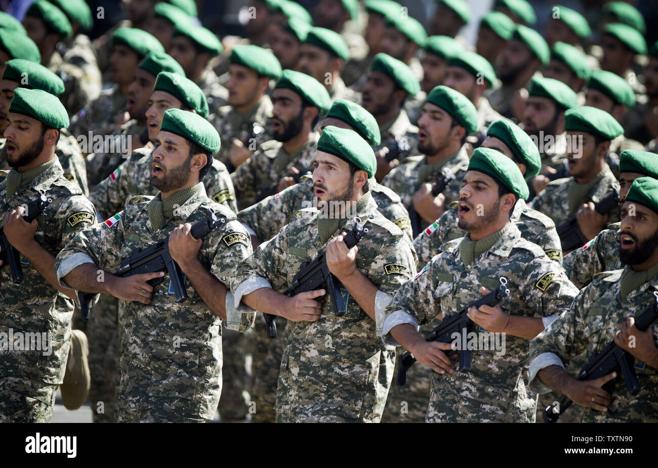 Iranian soldiers march during the annual military parade In front of ...