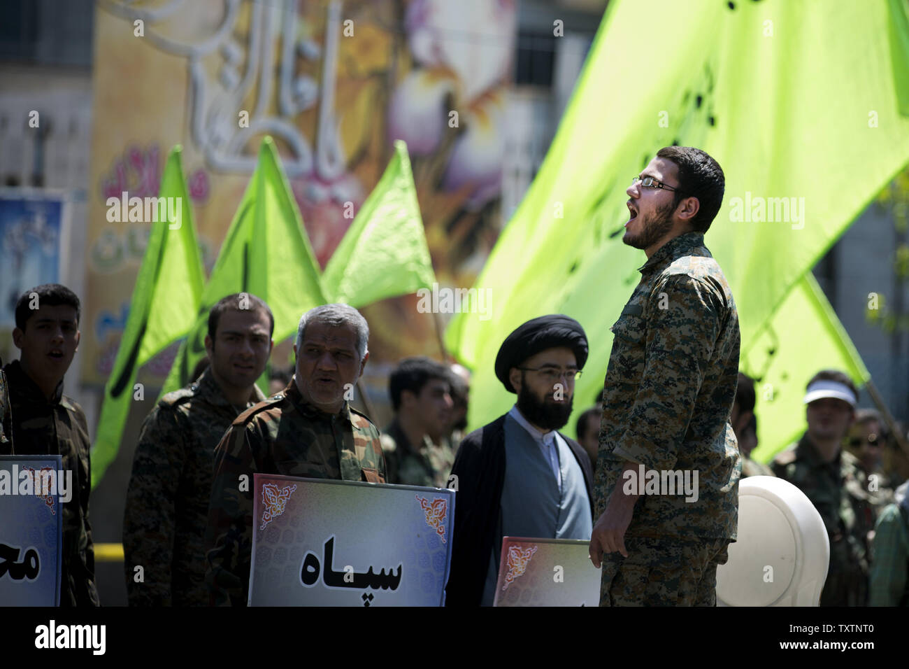 Members of the Basij militia attend a parade in Tehran, Iran on April ...