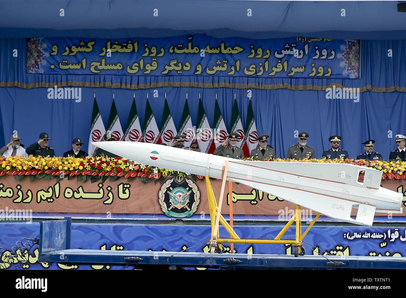 An Iranian-made ballistic Sedjeel missile is showcased during National ...