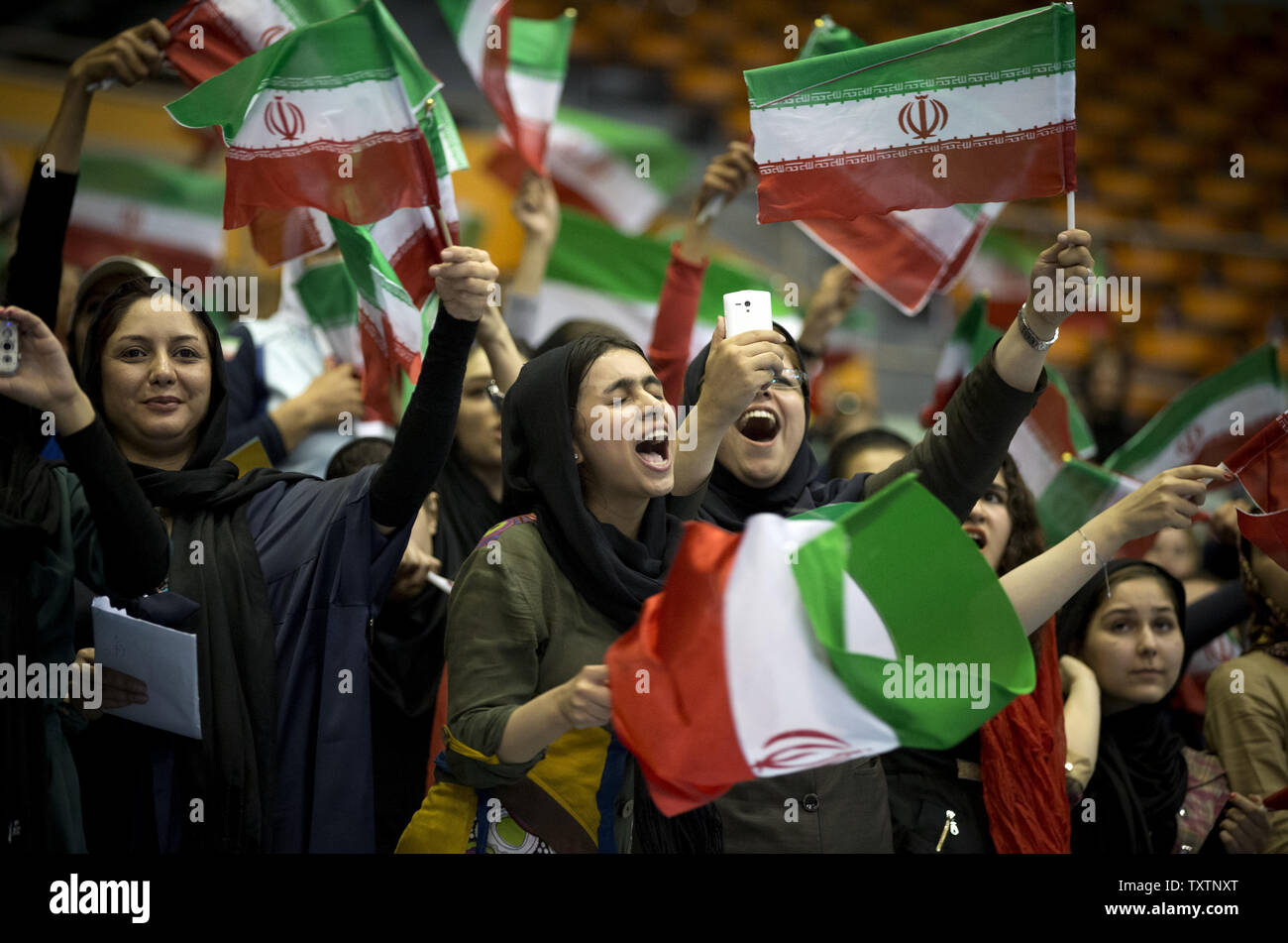 Iranian soccer fans attend a farewell ceremony for Iran's national team ...