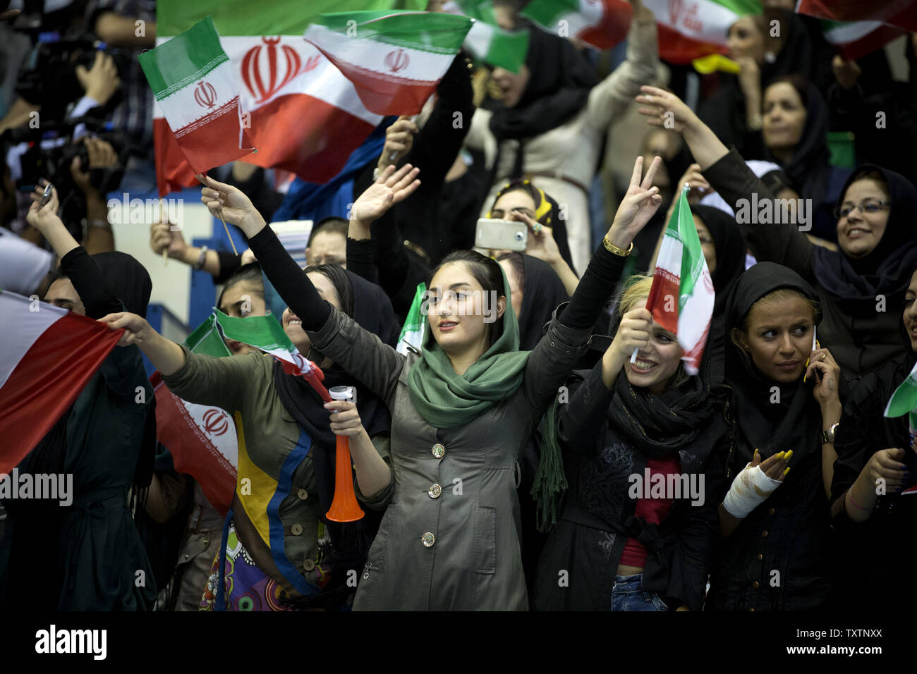 Iranian soccer fans attend a farewell ceremony for Iran's national team ...