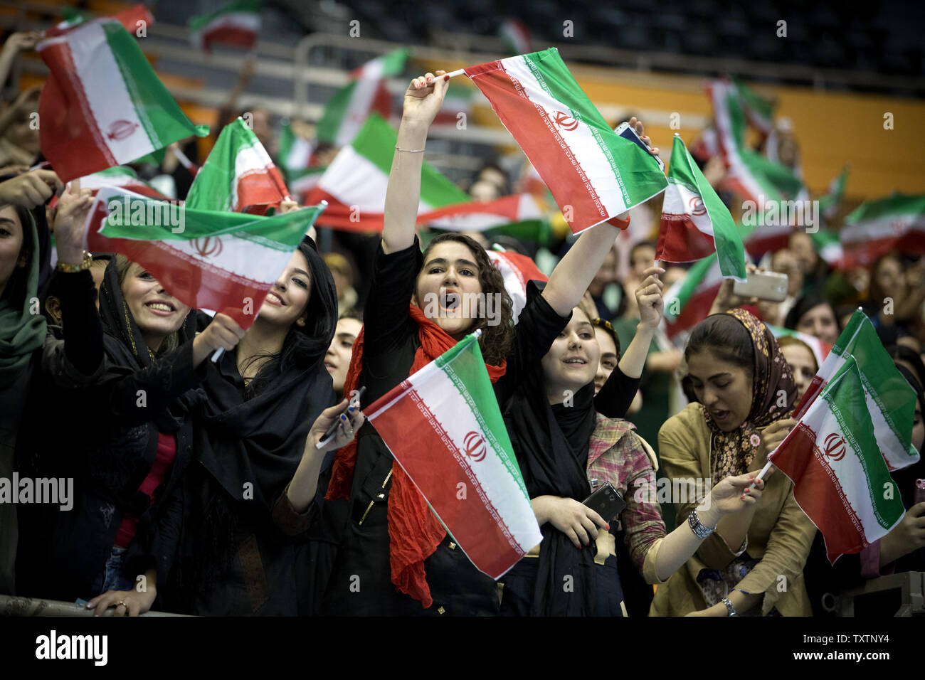 Iranian soccer fans attend a farewell ceremony for Iran's national team ...