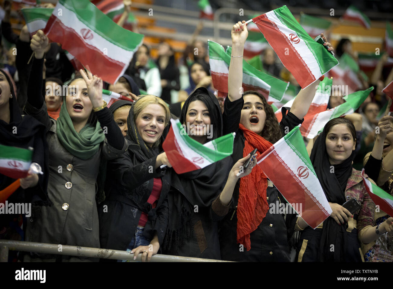 Iranian soccer fans attend a farewell ceremony for Iran's national team ...
