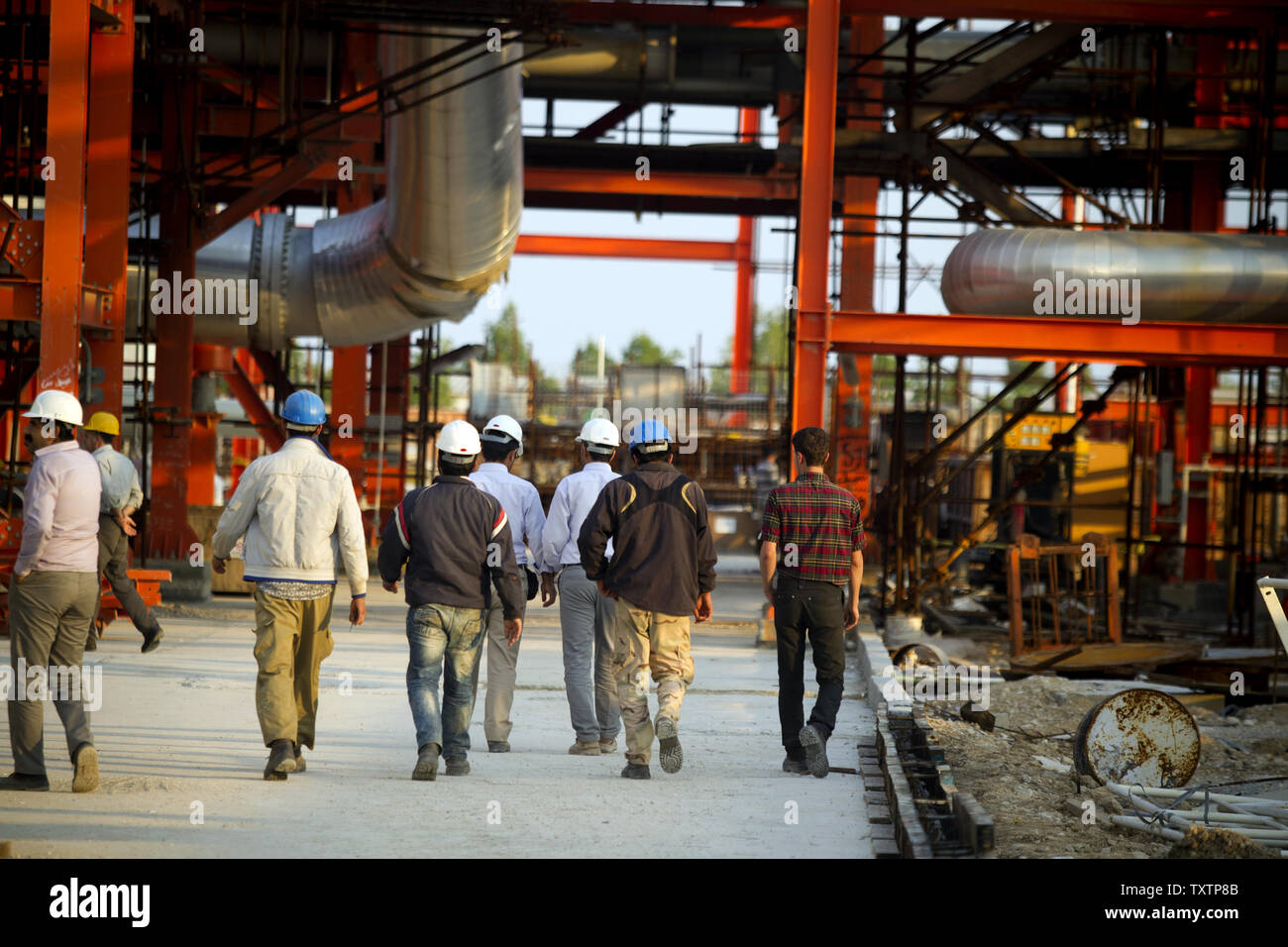 Iranians work on phase 15-16 of the South Pars gas field in the ...