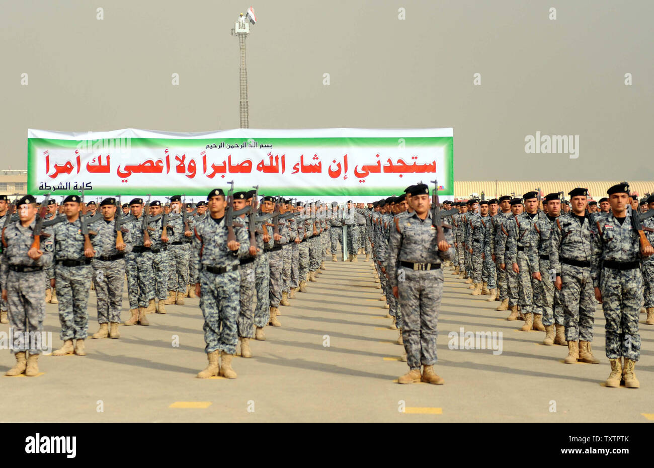 Iraqi national police celebrate during a Police Day ceremony in Baghdad ...