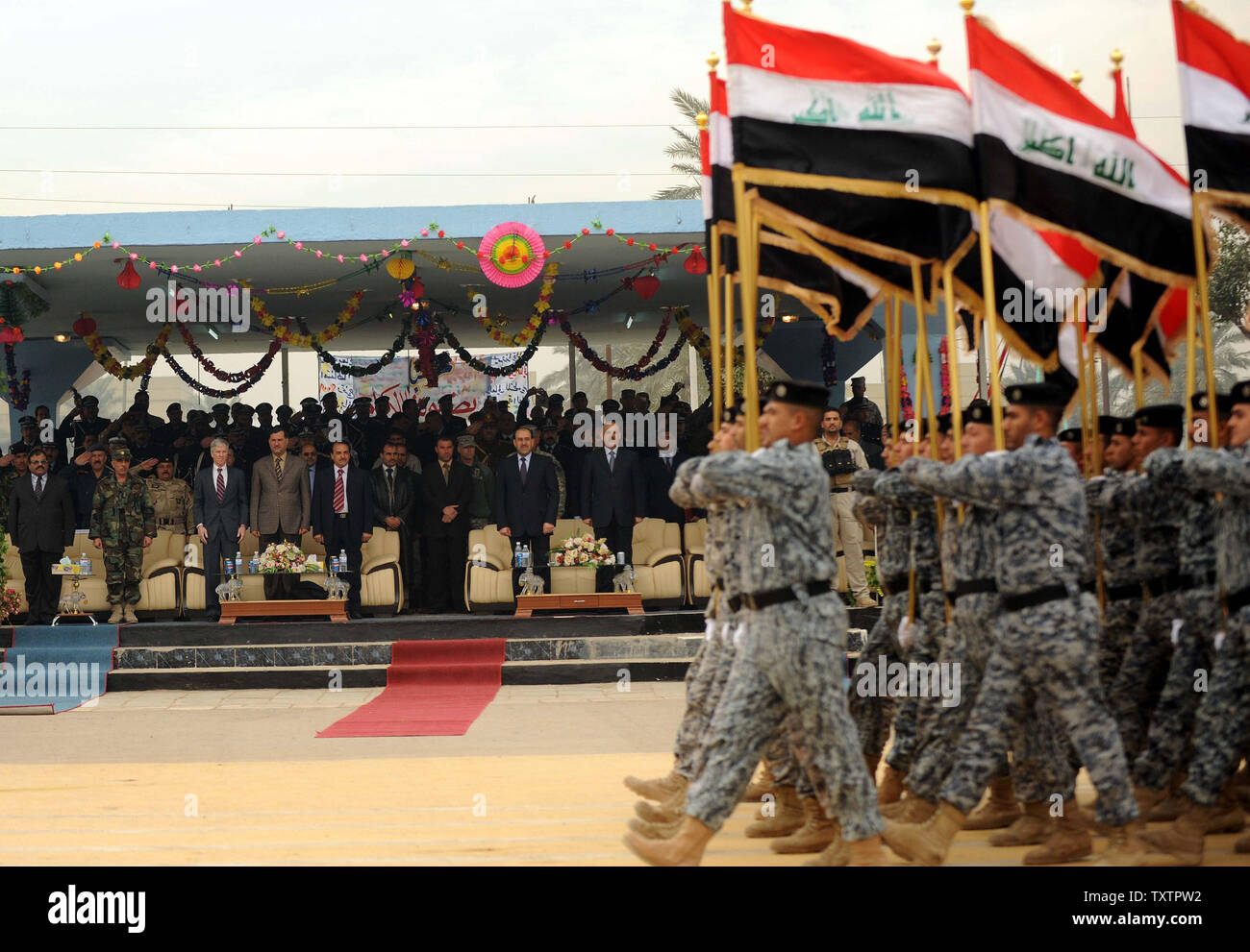 Iraqi national police celebrate during a Police Day ceremony in Baghdad ...