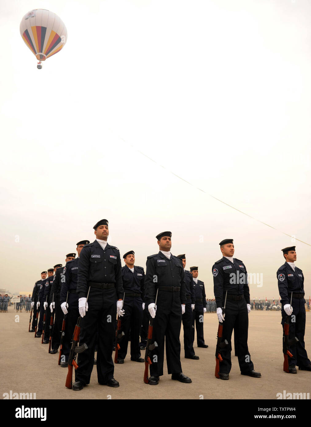Iraqi national police celebrate during a Police Day ceremony in Baghdad ...