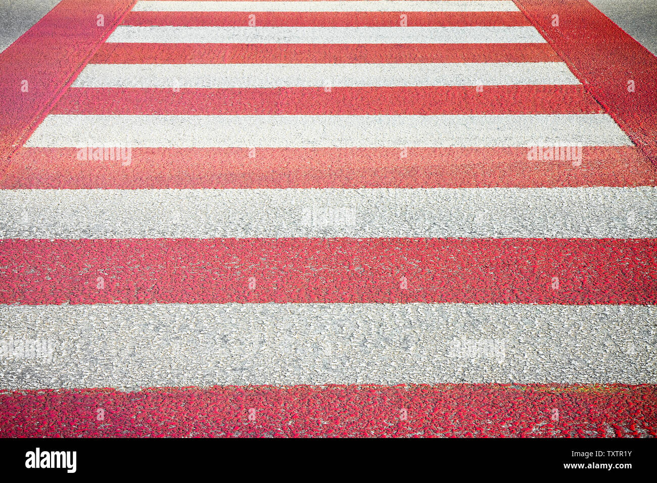 Red and white pedestrian crossing with copy space Stock Photo - Alamy