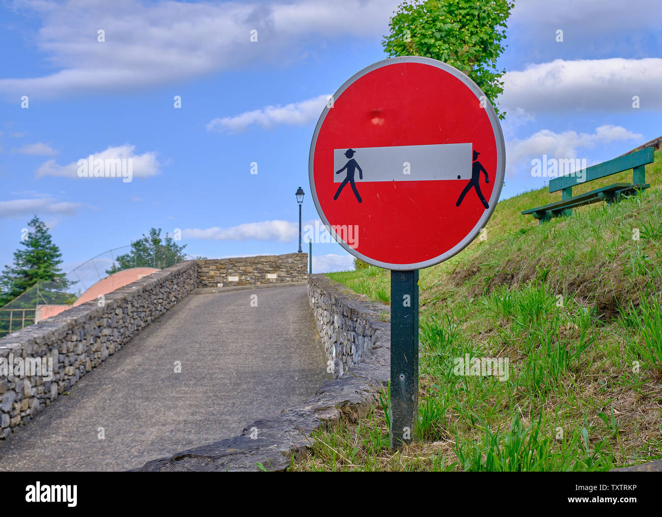 No Entry traffic sign, modified by adding human shape sticker to make ...