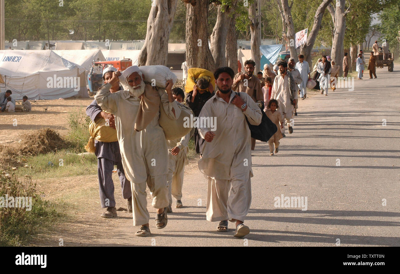 Local residents flee from Mingora, the main town of Pakistan's troubled ...