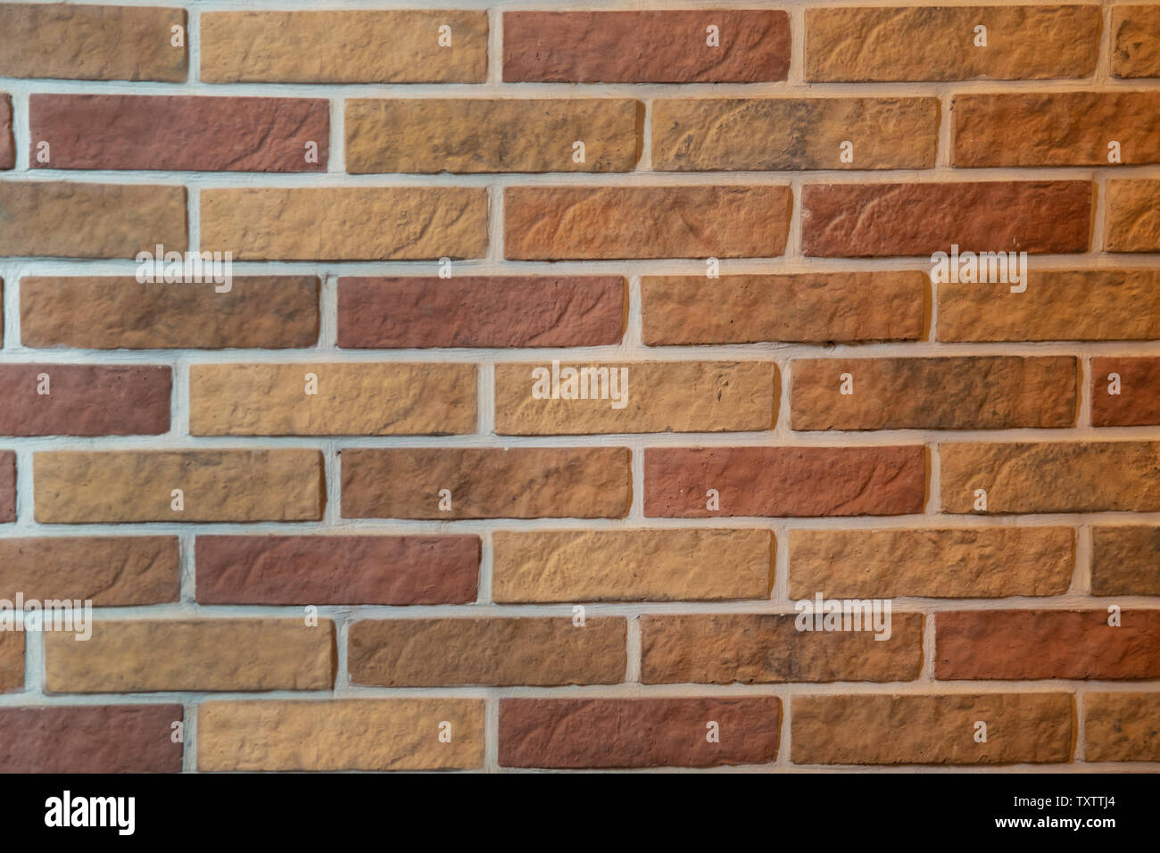 New multi-colored brick wall. texture background. Modern brick wall ...