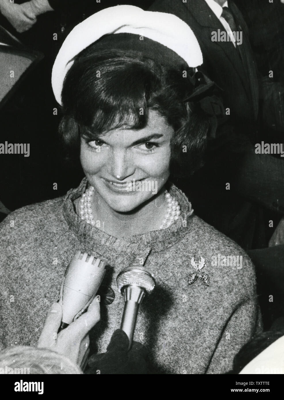 First Lady Jacqueline Kennedy speaks to reporters as she leaves the ...