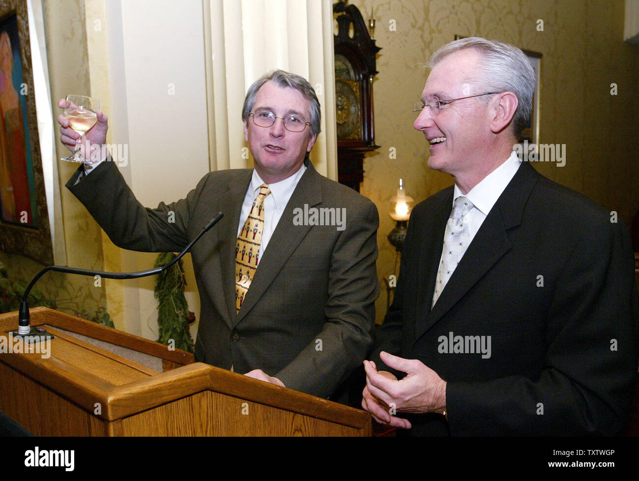 Gov. Bob Holden (R) is toasted by his brother Calvin at the Governor's ...
