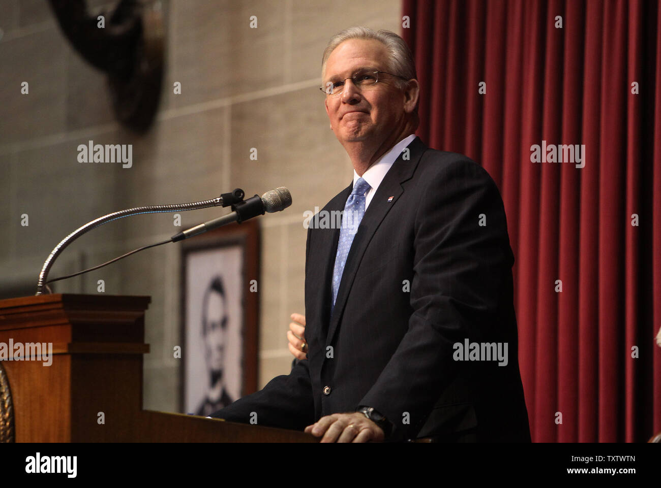 Missouri Governor Jay Nixon smiles as he prepares to deliver the State ...