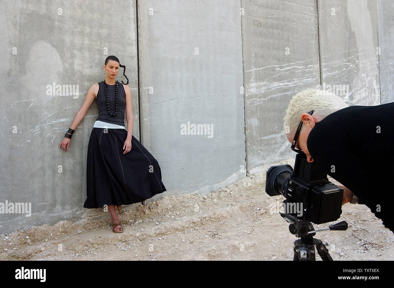 An Israeli fashion photographer shoots an International model posing ...