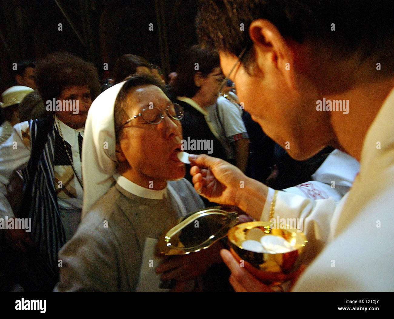 Nun receives hi-res stock photography and images - Alamy