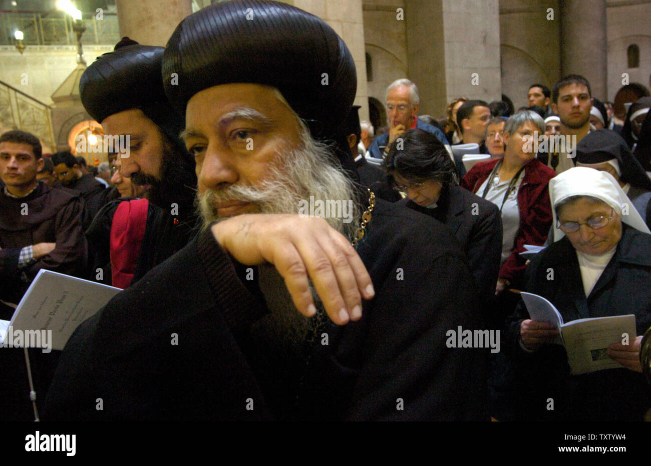 Coptic priests attend the Requiem Mass for Pope John Paul II in front ...