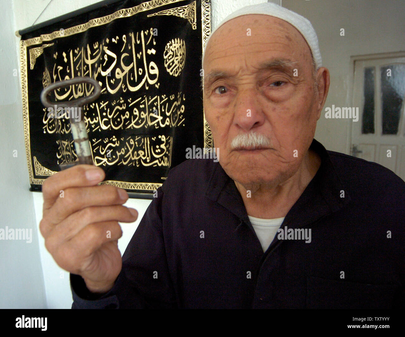 Palestinian refugee, Khalel Allham, 77 years, holds the key to the ...