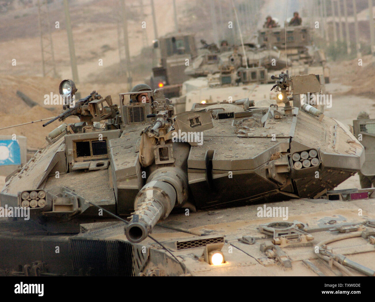 An Israeli Army convoy leaves the Gaza Strip, September 12, 2005 ...