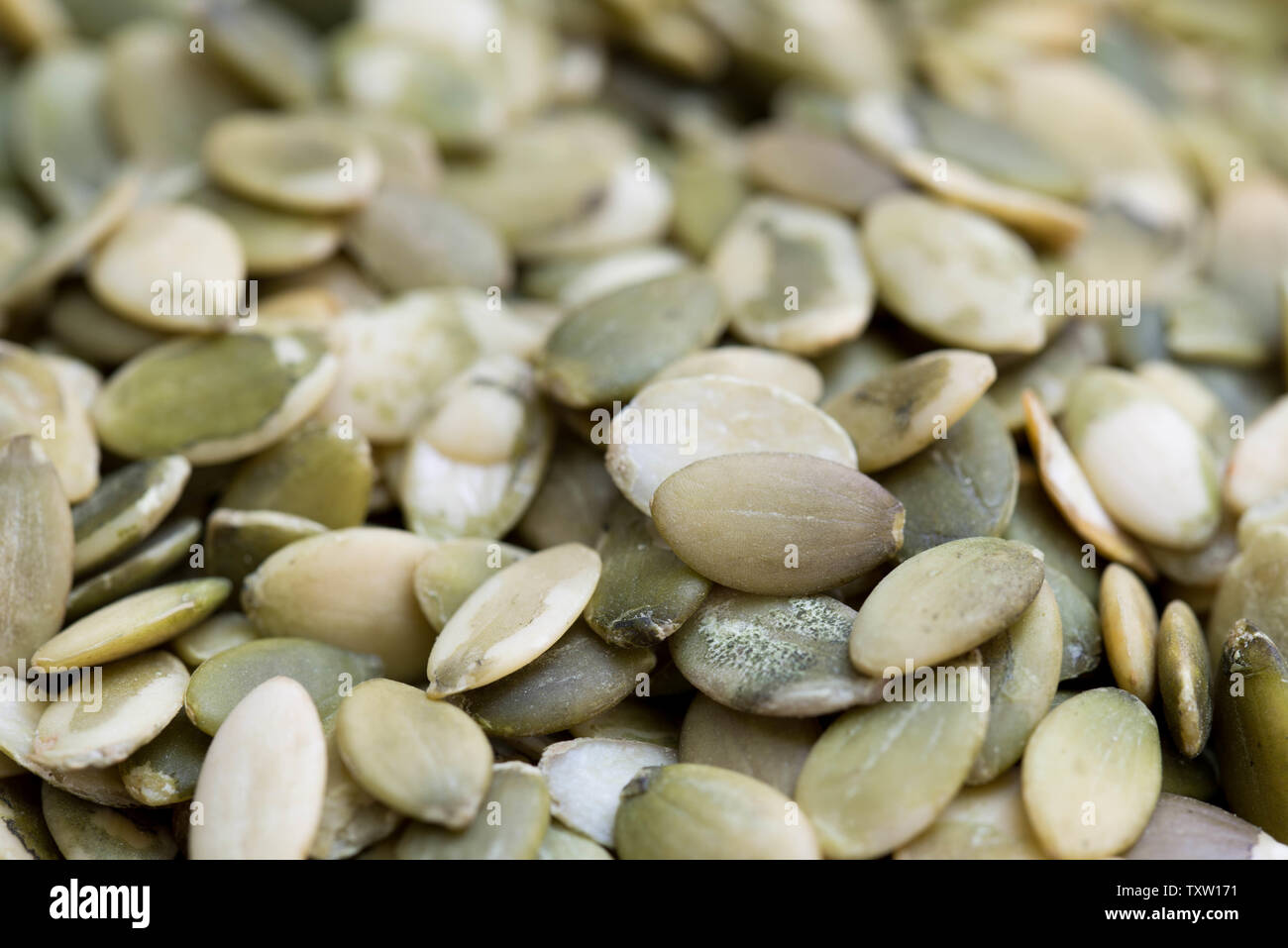 healthy dried pumpkin seeds macro Stock Photo - Alamy