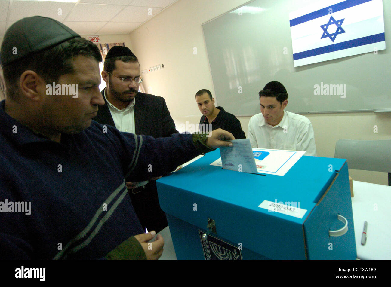 An Orthodox Jew votes in the Israeli general elections, March 28, in ...