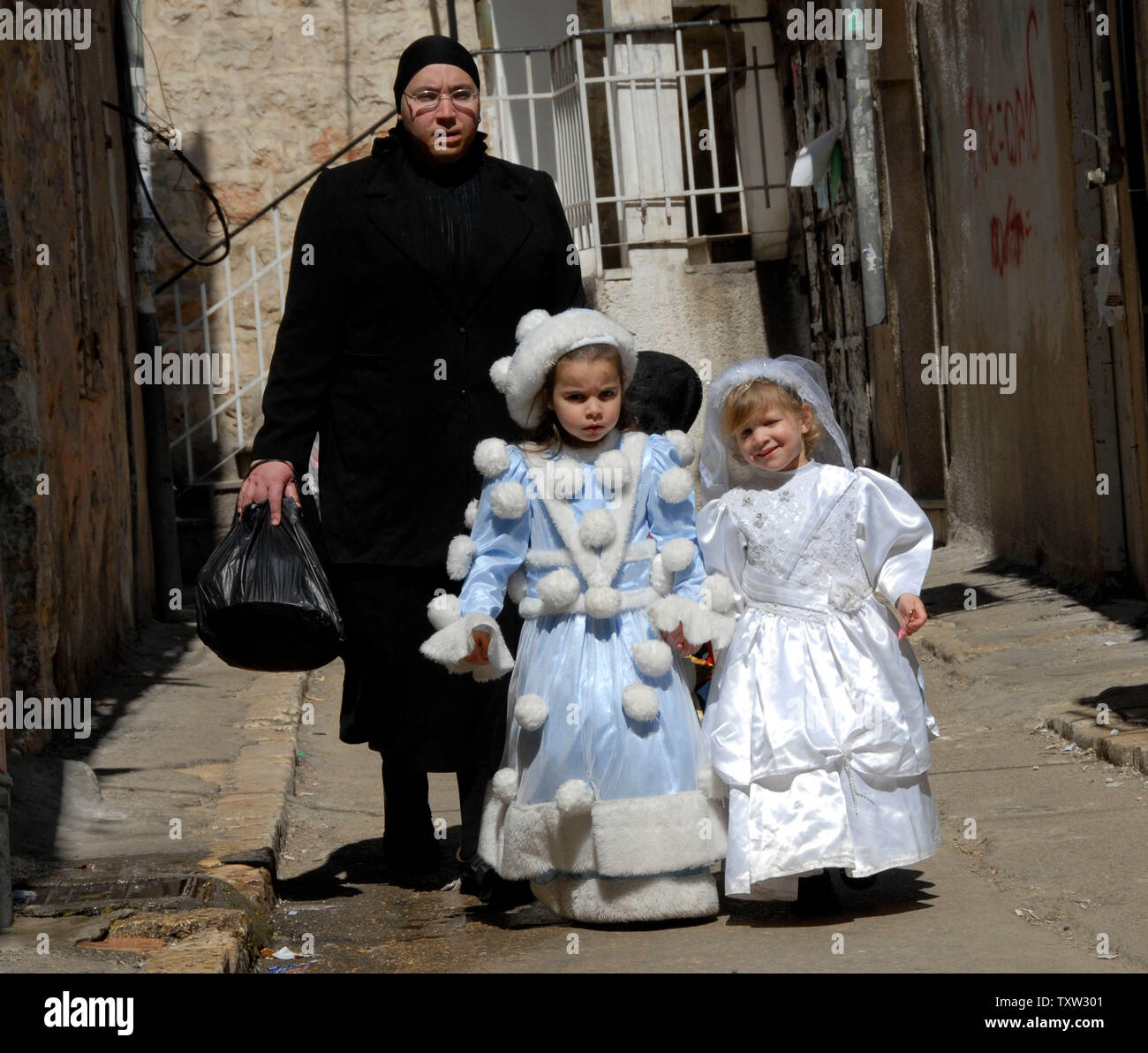 Ultra-orthodox girls wear costumes to celebrate the Jewish holiday ...
