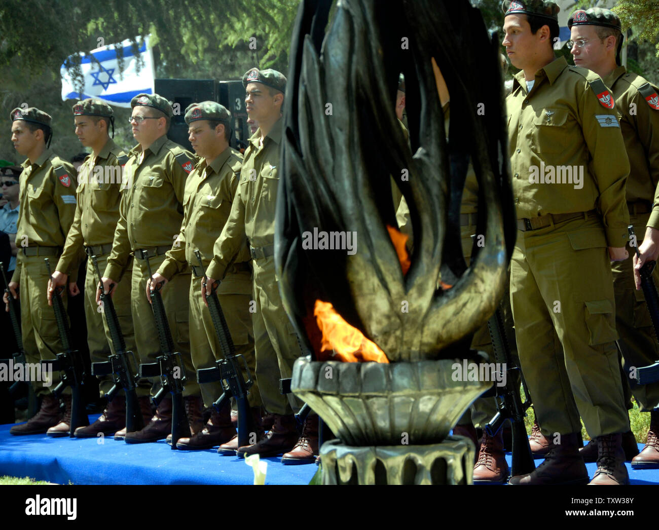 Israeli soldiers stand at attention at the official ceremony for ...