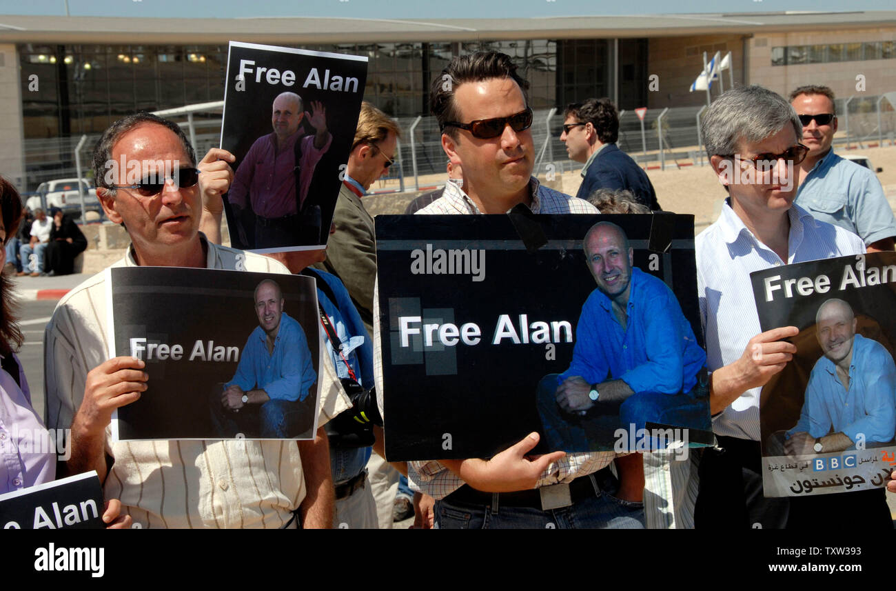 Journalists demonstrate for the release of kidnapped BBC reporter Alan ...