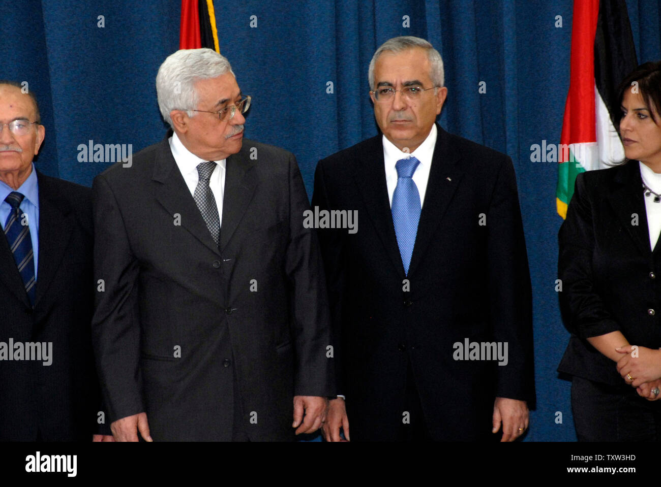 Palestinian President Mahmoud Abbas and Prime Minister Salam Fayad ...