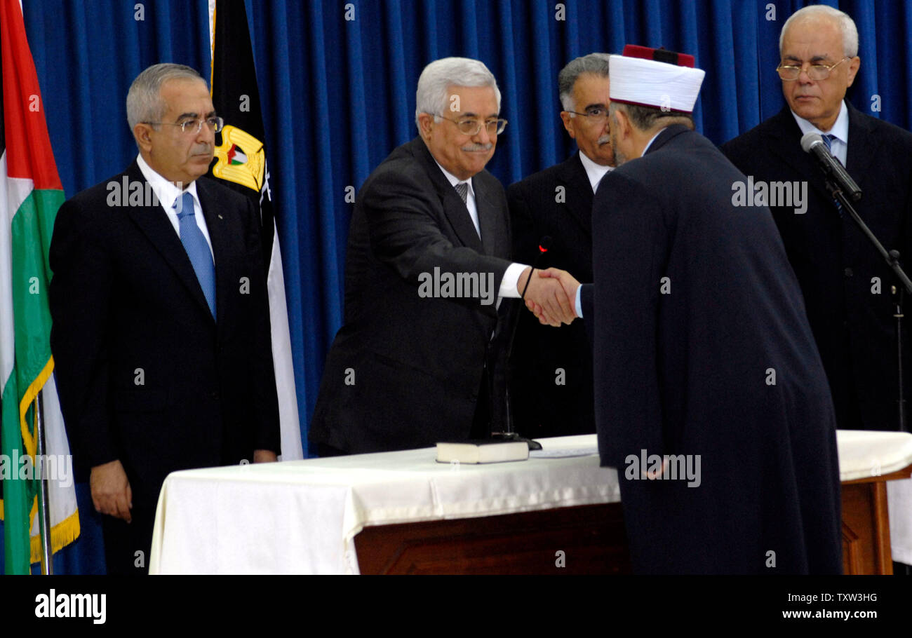 Palestinian President Mahmoud Abbas and ,left, Prime Minister Salam ...