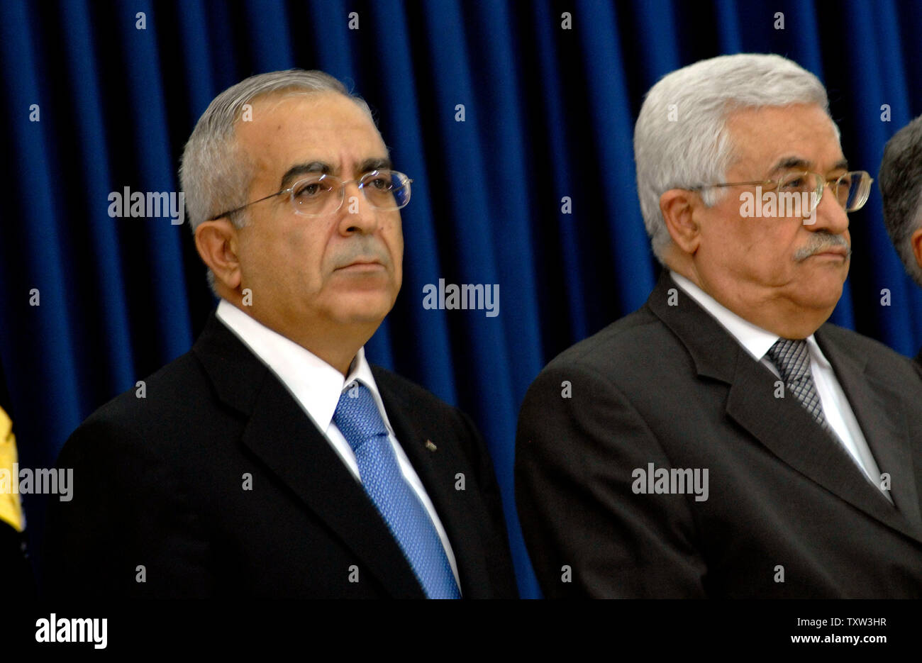 Newly sworn in Prime Minister Salam Fayad and Palestinian President ...