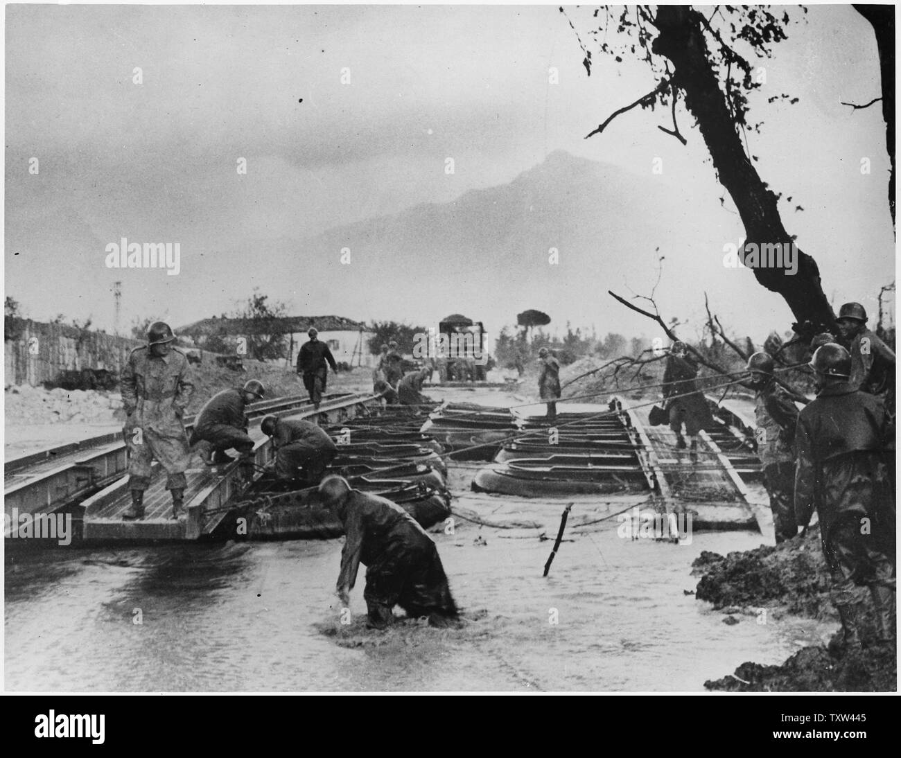 A soldier wading through water in China Stock Photo - Alamy