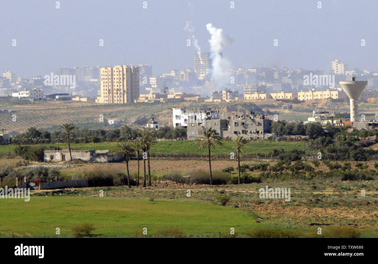Smoke rises over Gaza from Israeli fired shells on the eleventh day of ...