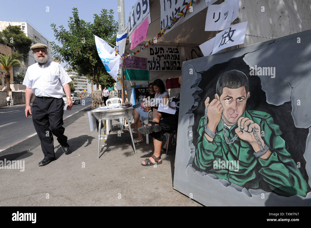 A man walks past a protest tent for the release of kidnapped Israeli ...