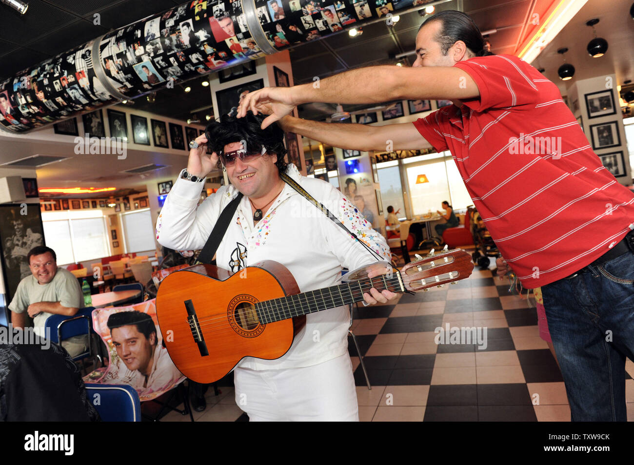 Israeli Elvis impersonator Yonathan Avidan, 38, performs at the Elvis ...
