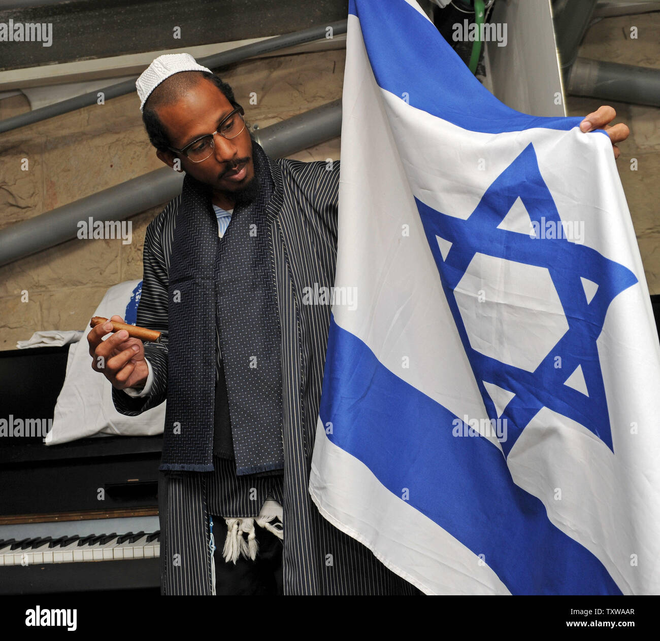 The rapper Shyne holds an Israeli flag before the world premiere of his ...